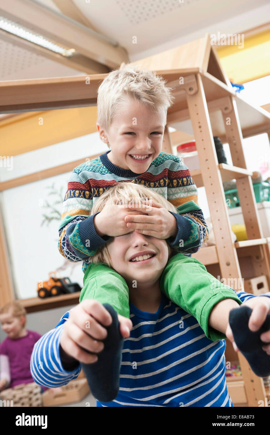 Two brothers playing together Stock Photo - Alamy