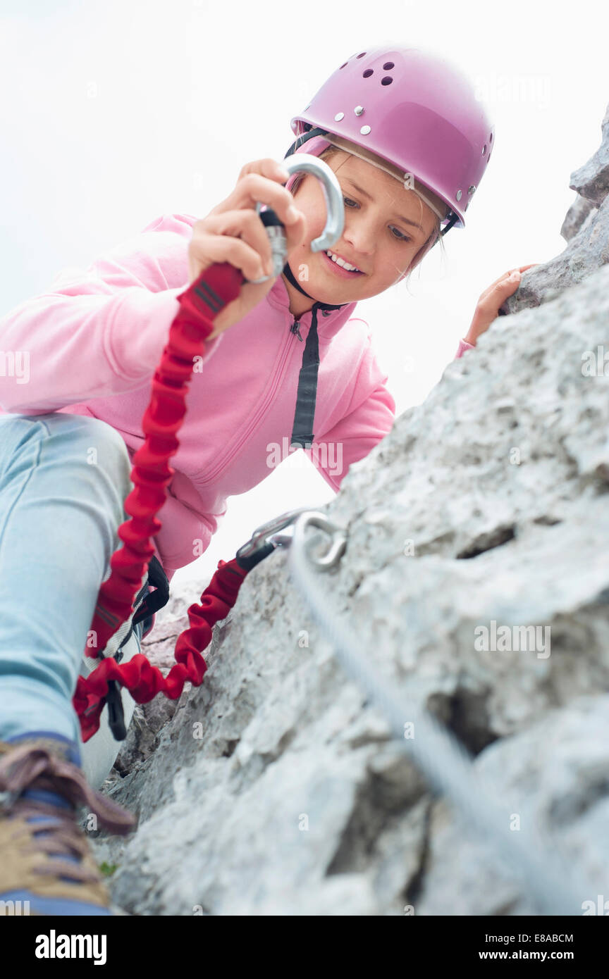 Young girl climbing hi-res stock photography and images - Alamy