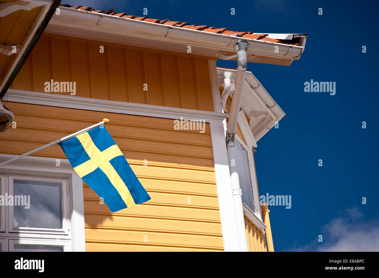 Scandinavian idyll with swedish flag hi-res stock photography and ...