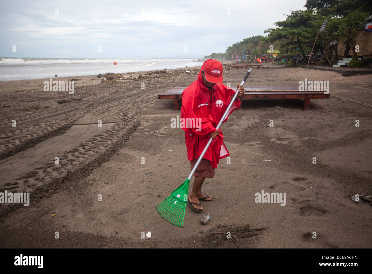 Asian people collecting garbage on beach Stock Photo - Alamy