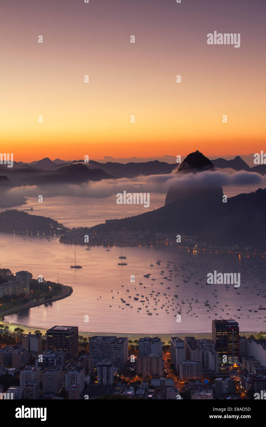 View of Sugarloaf Mountain and Botafogo Bay at dawn, Rio de Janeiro ...