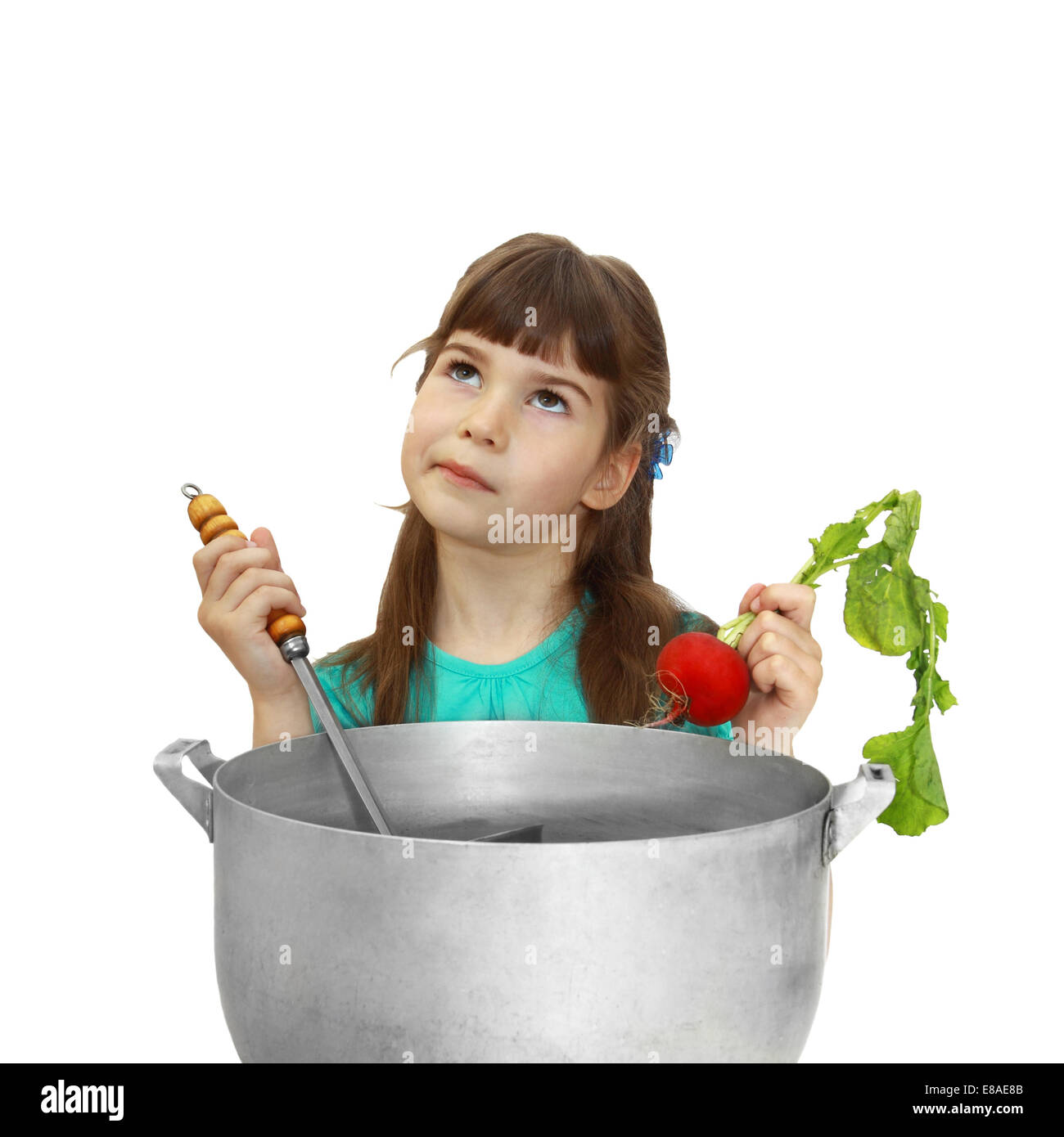 Girl trying to cook isolated on white background Stock Photo - Alamy