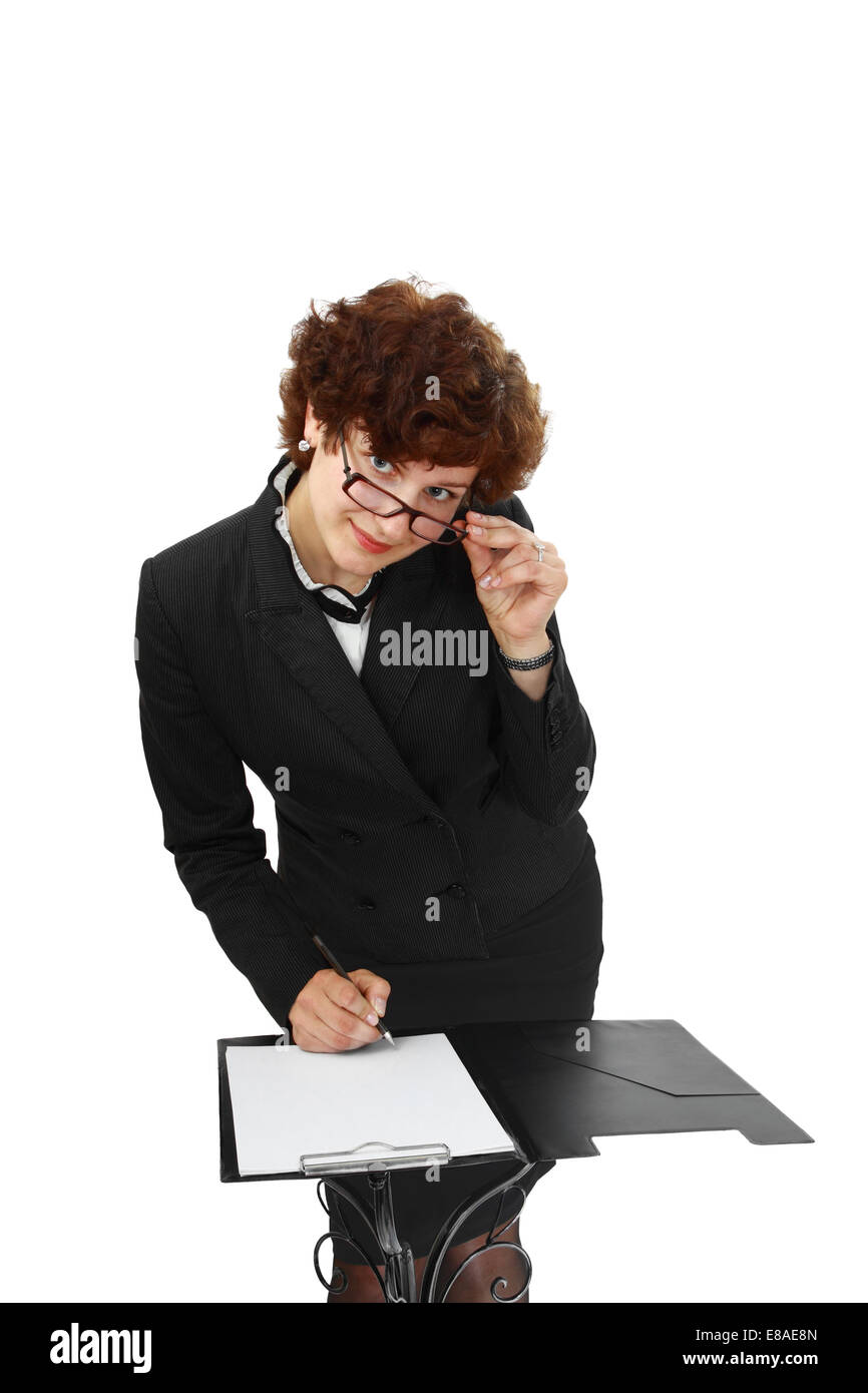 Pretty business woman signs documents isolated on white background ...