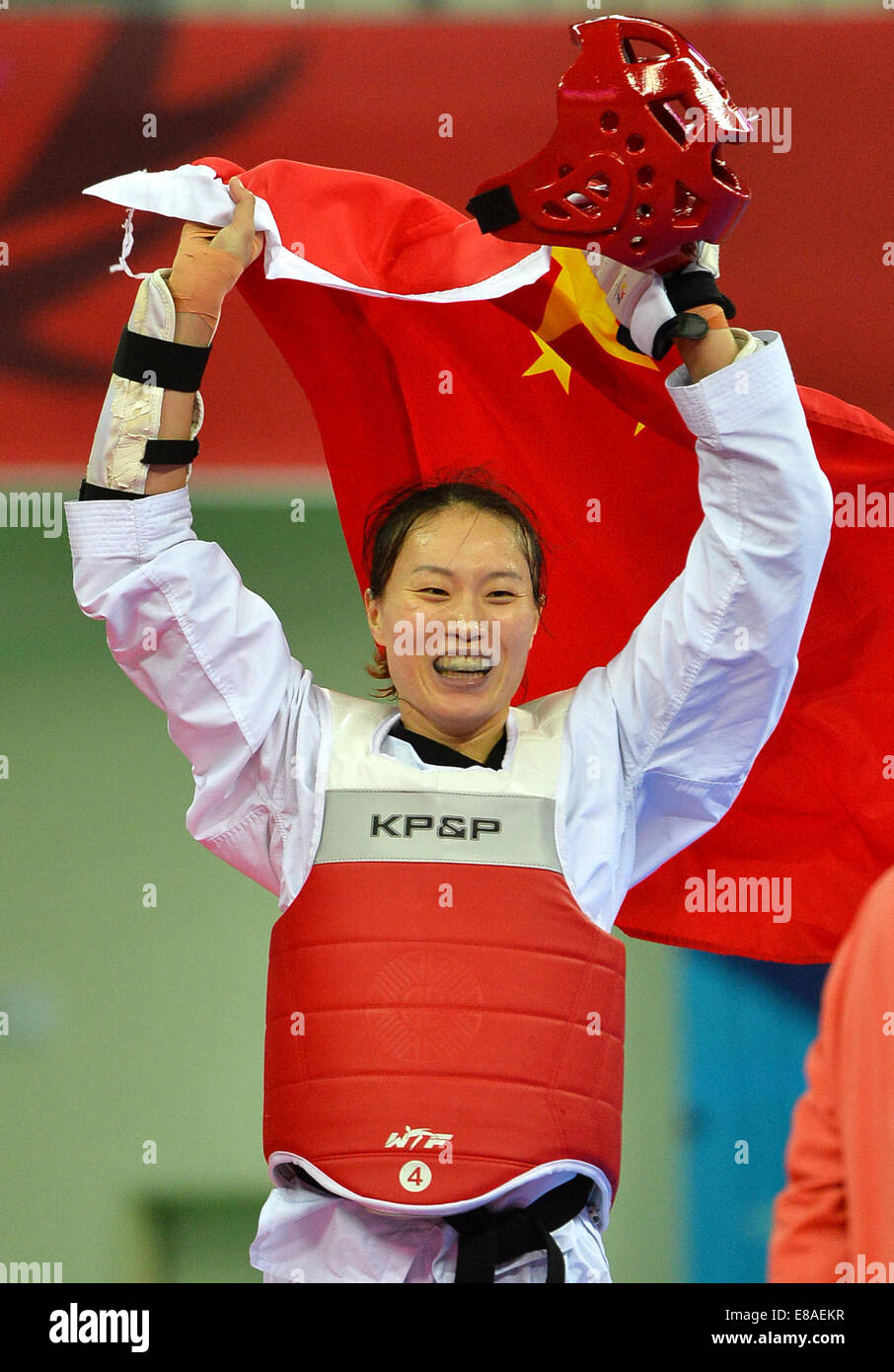 Incheon, South Korea. 3rd Oct, 2014. Li Donghua of China celebrates ...