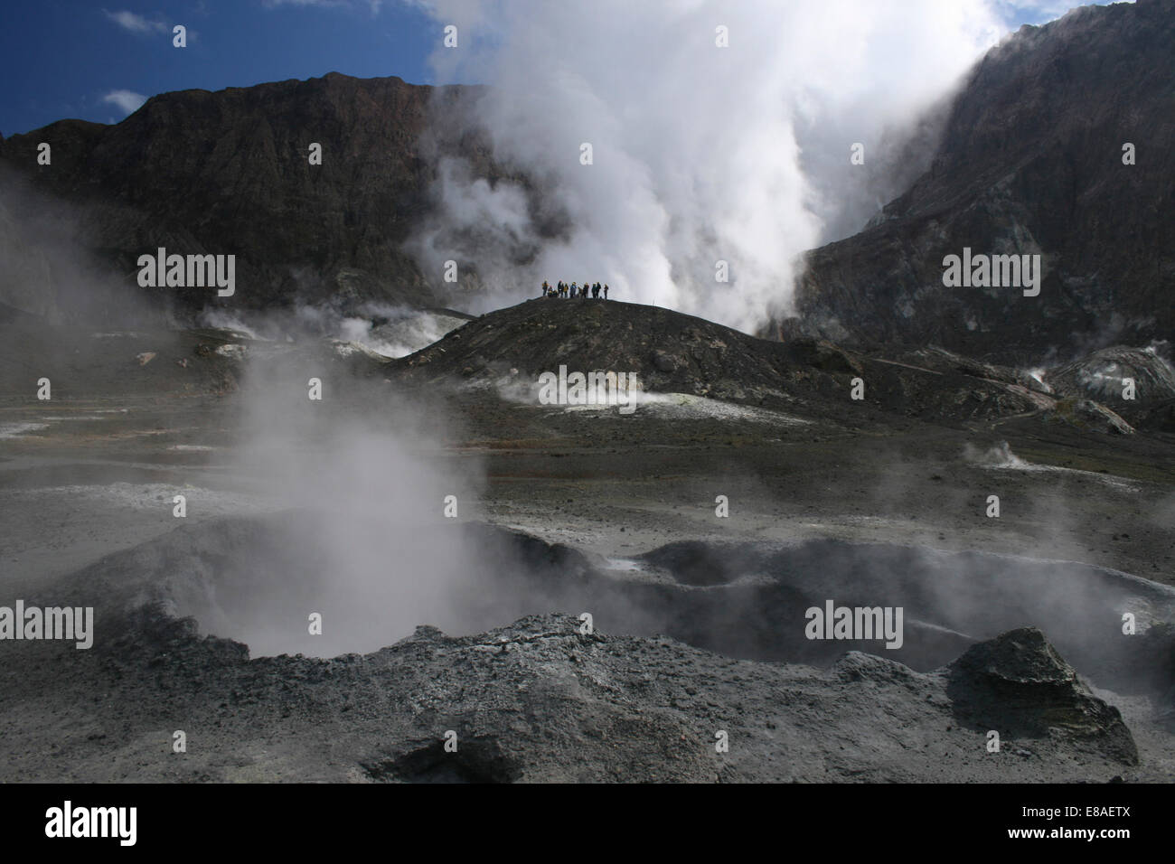 People standing on the volcanic White Island, New Zealand Stock Photo ...