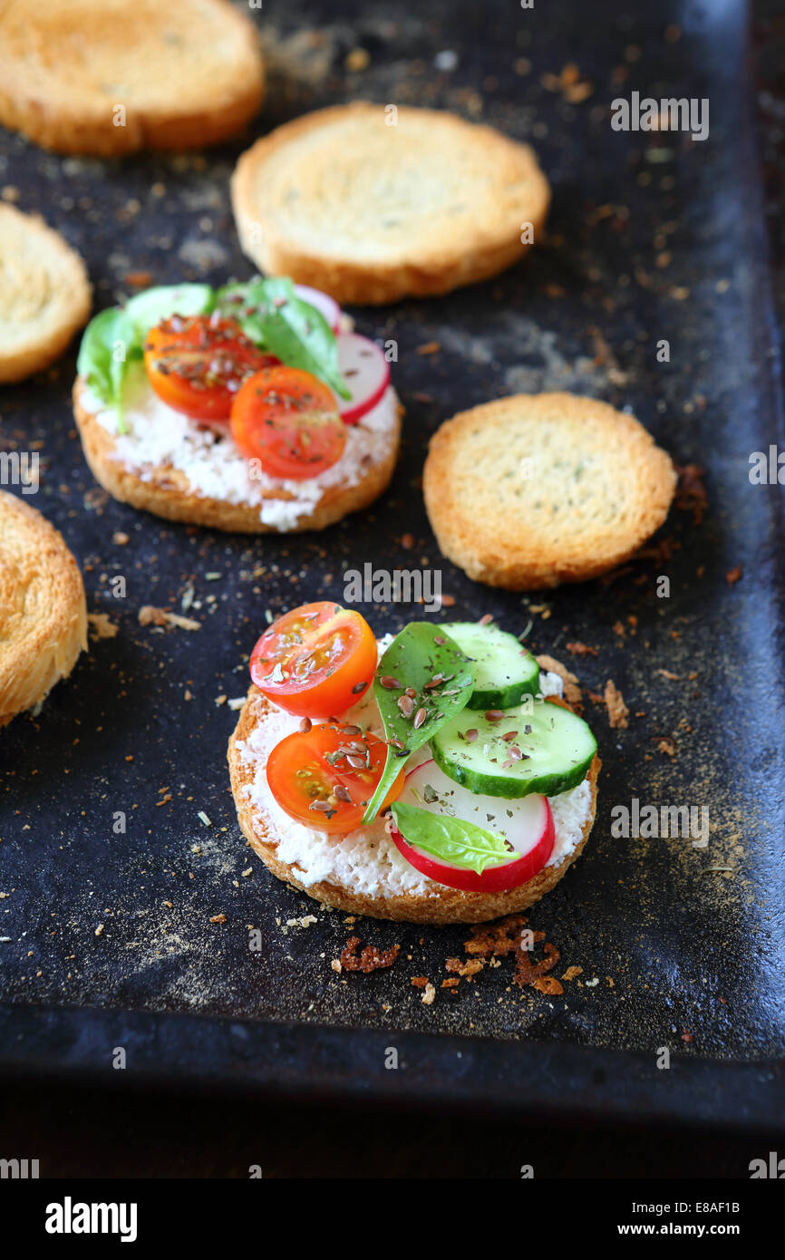 Canape with tomato and cucumber, top view Stock Photo - Alamy
