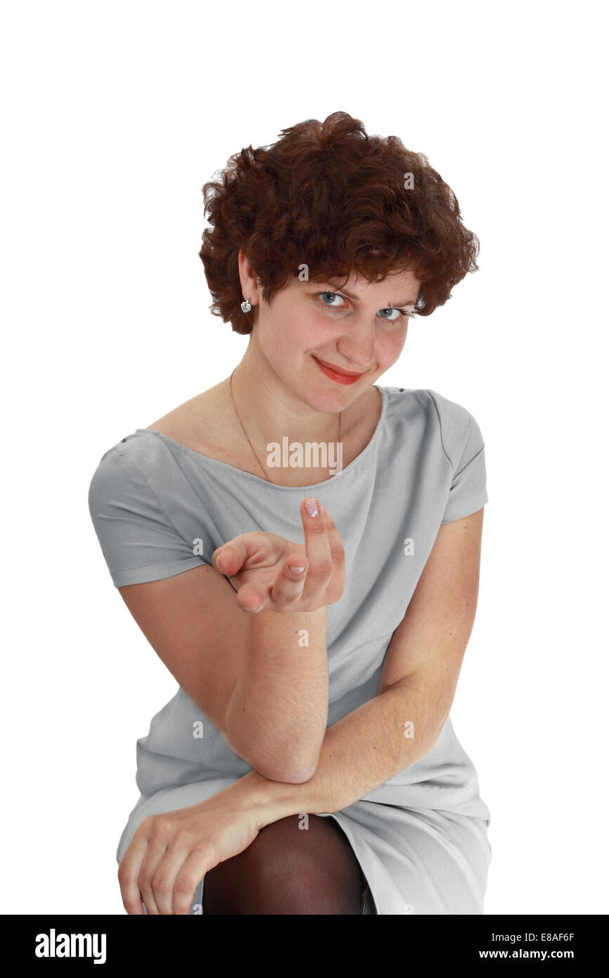 Young woman sits with a flirtatious expression on his face isolated on ...