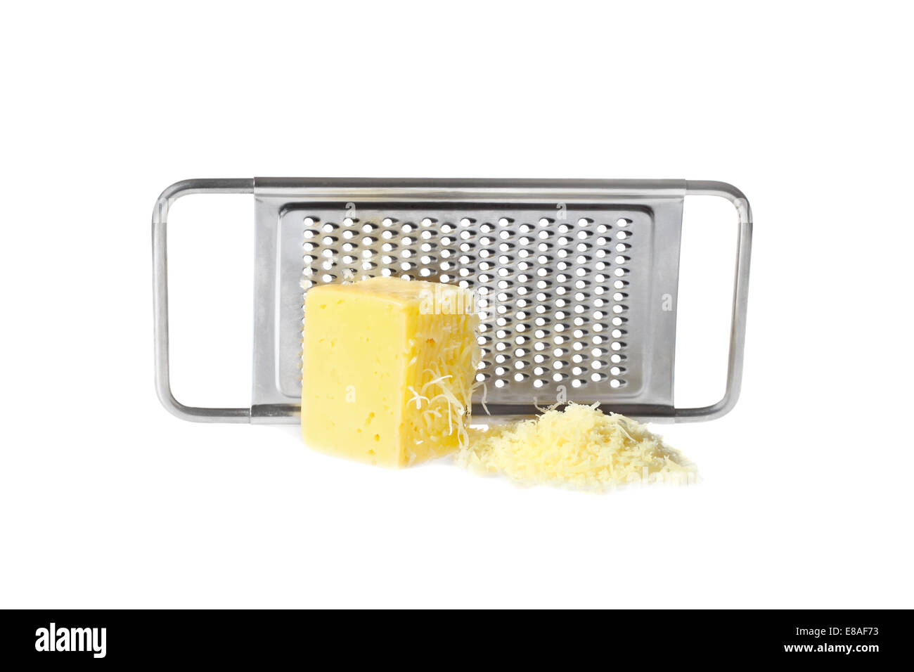 Cheese grated and piece in front of grater isolated on white background ...