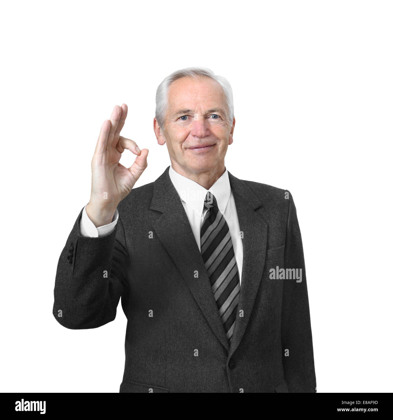 Senior man with friendly face shows okay by fingers isolated on white ...
