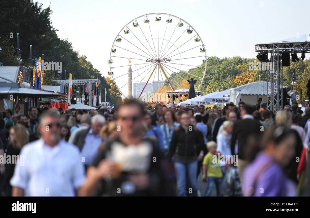 Berlin, Germany. 3rd October, 2014. Visitors on the party mile on ...