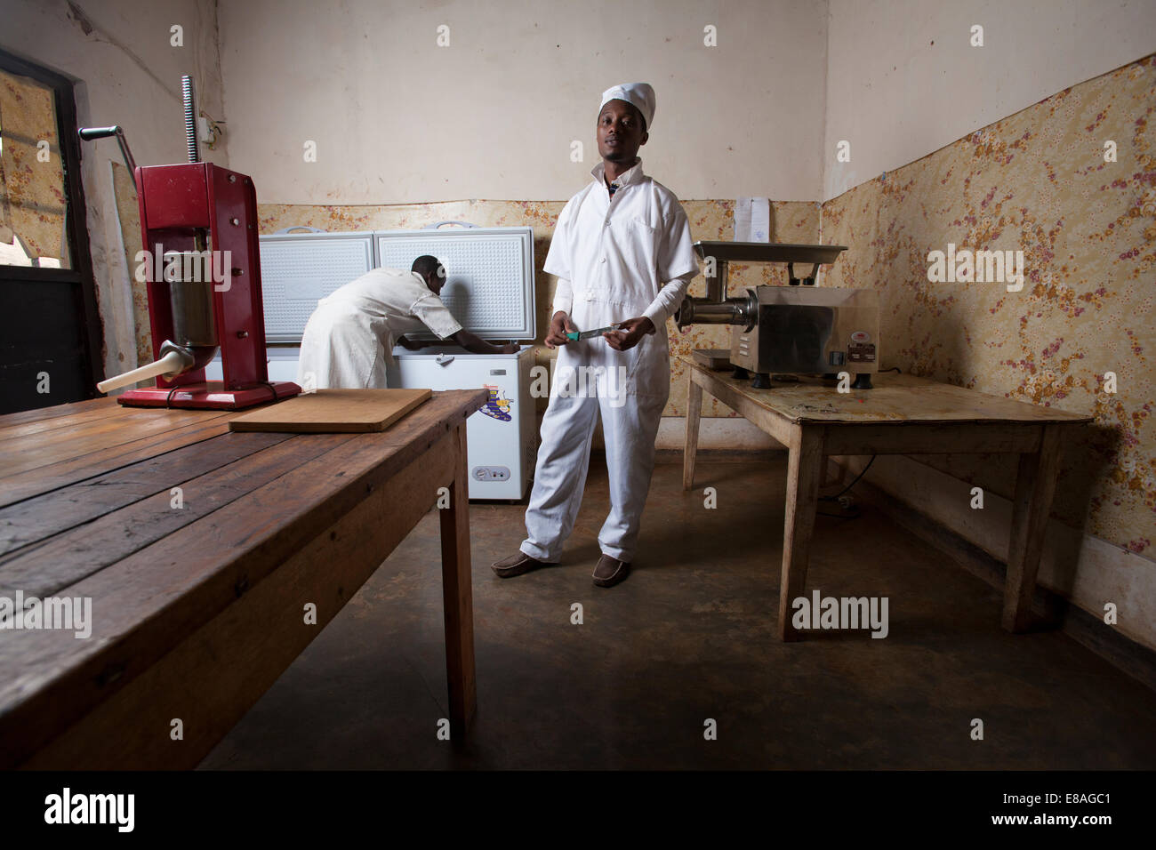 African butcher poses in his meat processing room, Kigali, Rwanda Stock ...