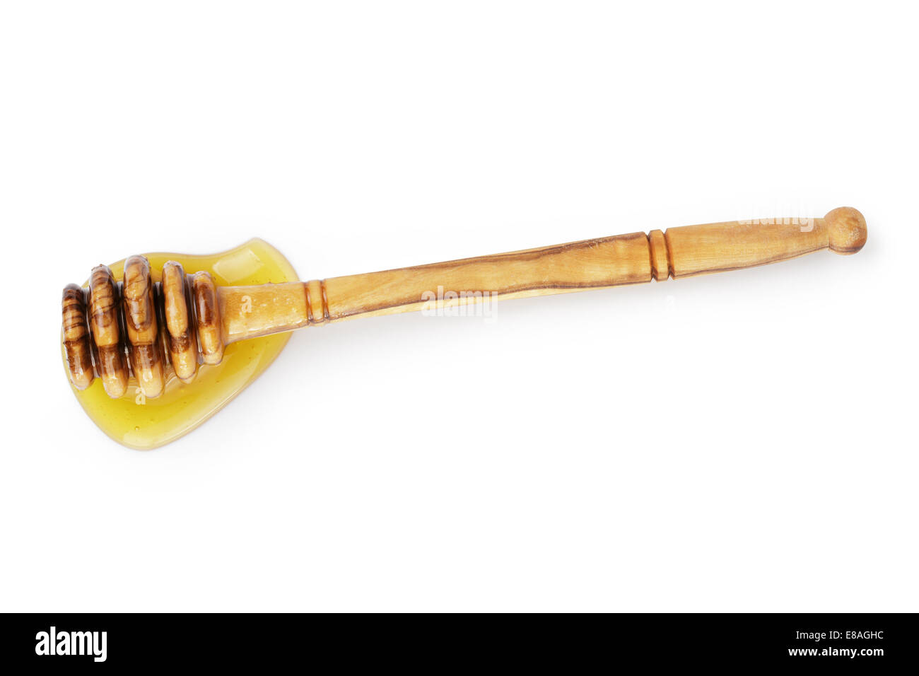 olive dipper with pure maple honey, start to crystallize isolated on ...
