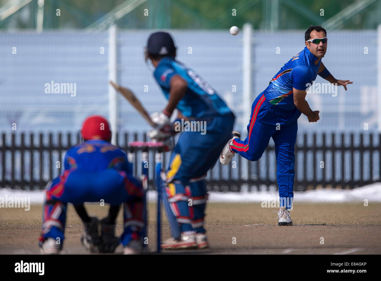 Incheon, South Korea. 3rd Oct, 2014. Eisakhil Mohammad Nabi (R) of ...