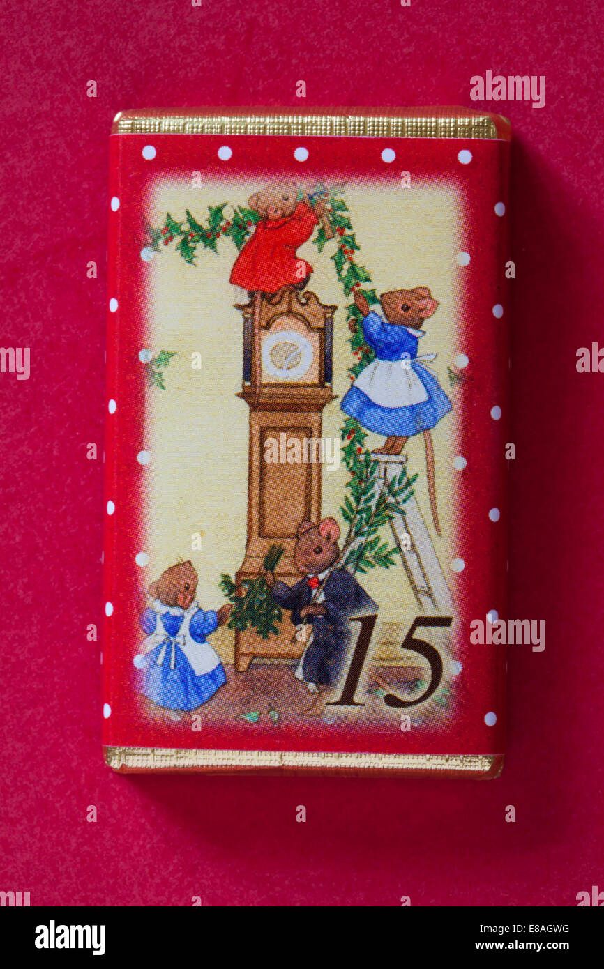 Count down to Christmas with individual advent chocolate bars isolated ...