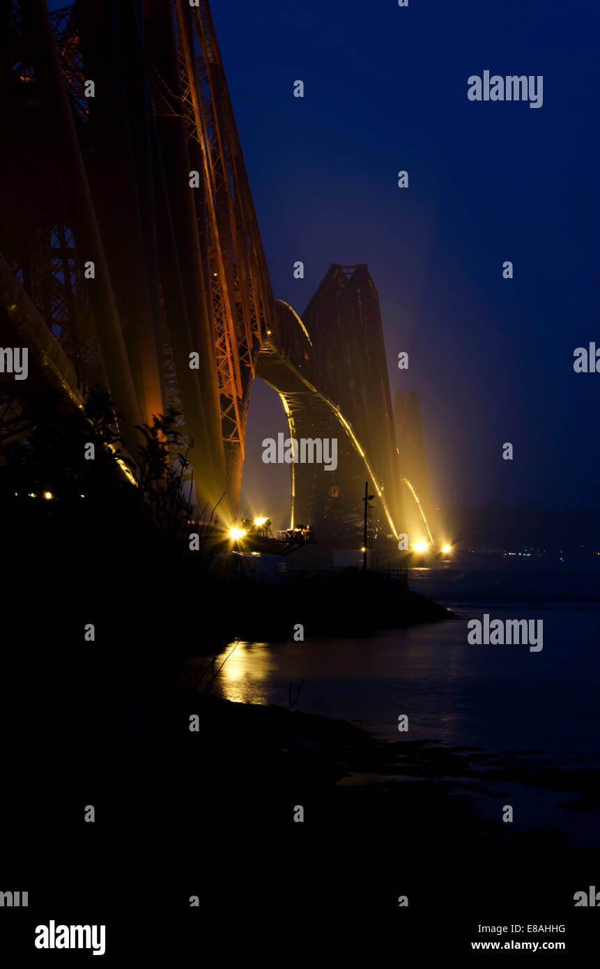 The Forth (railway) Bridge lit-up at night, Queensferry, Scotland Stock ...