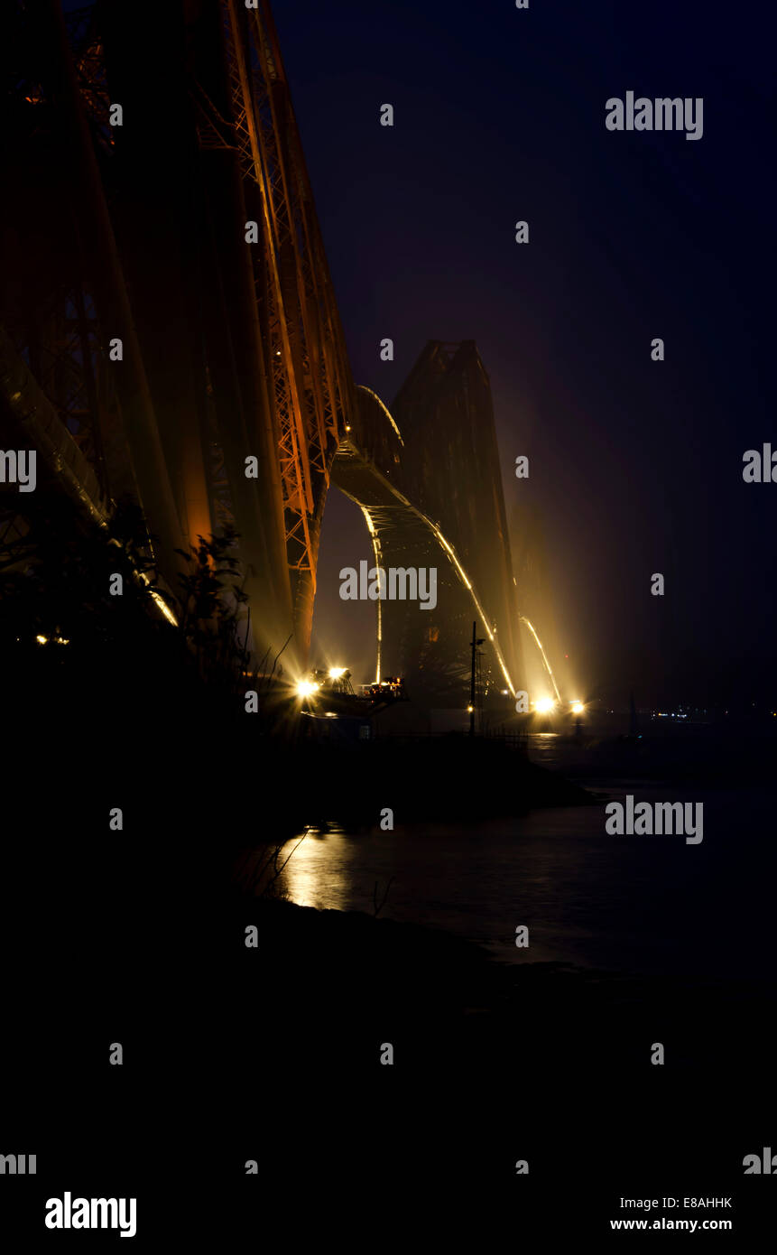 The Forth (railway) Bridge lit-up at night, Queensferry, Scotland Stock ...