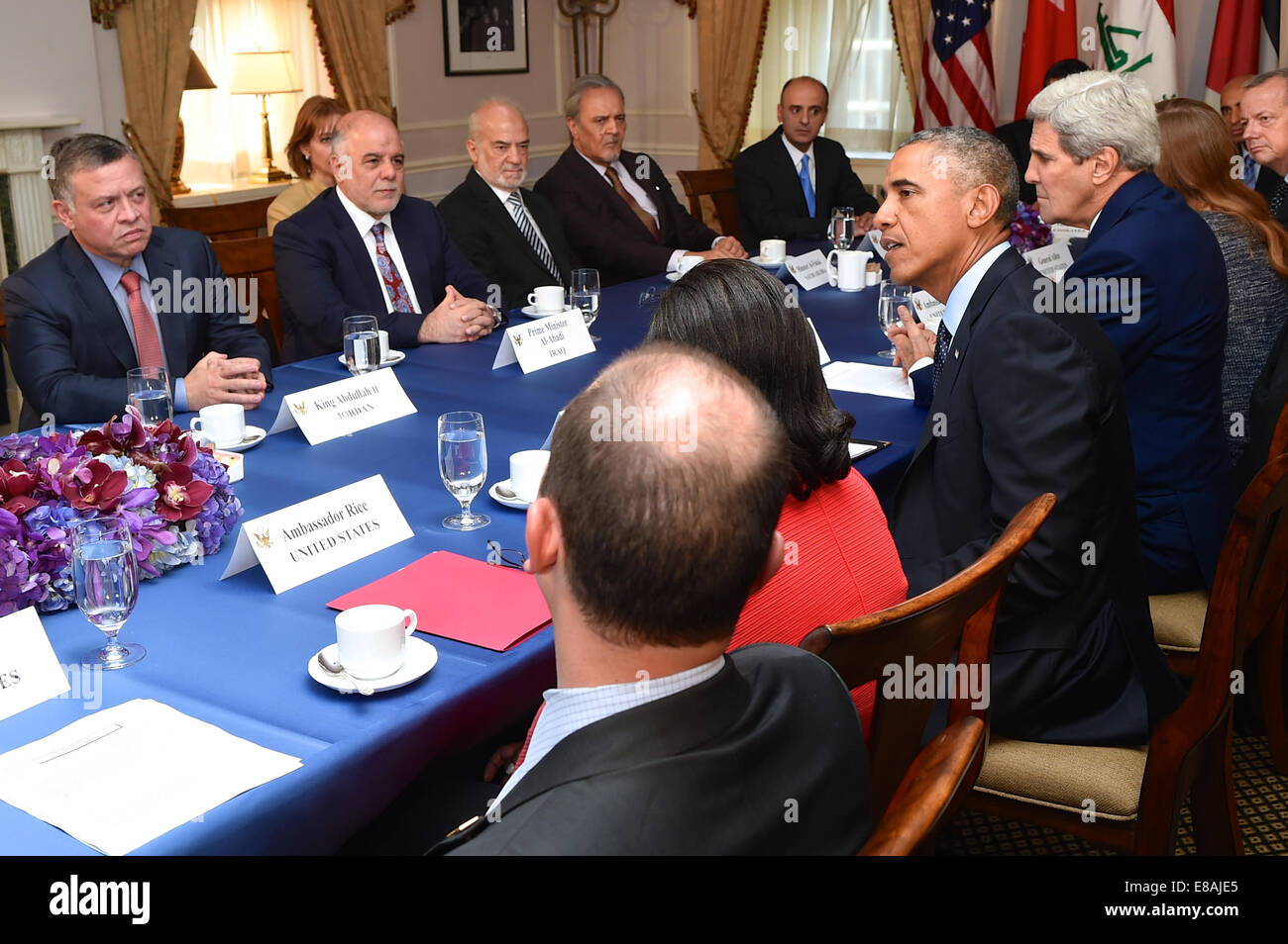 President Obama, flanked by National Security Adviser Susan Rice and U ...