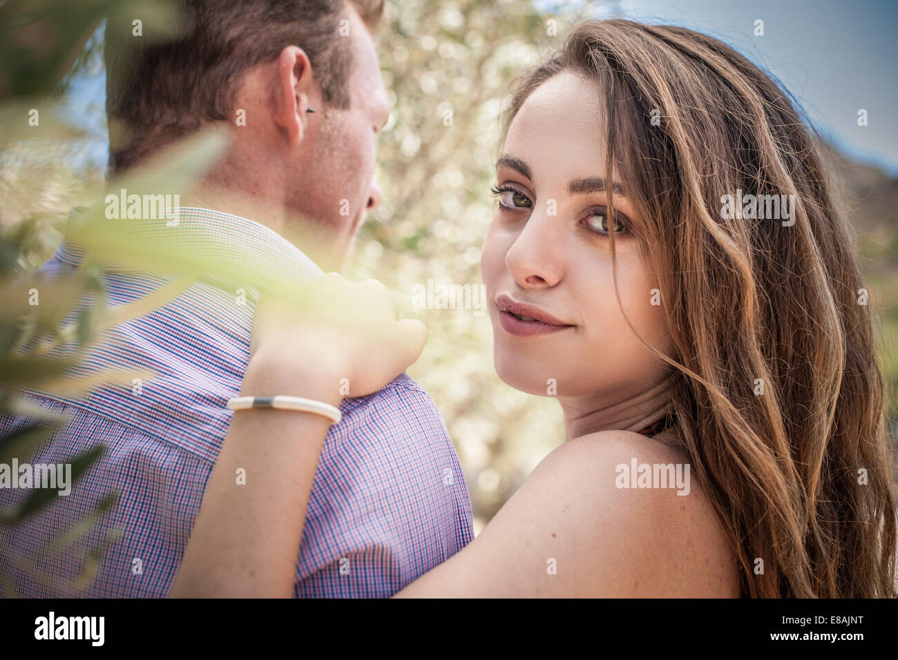 Woman back over shoulder dark hi-res stock photography and images - Alamy