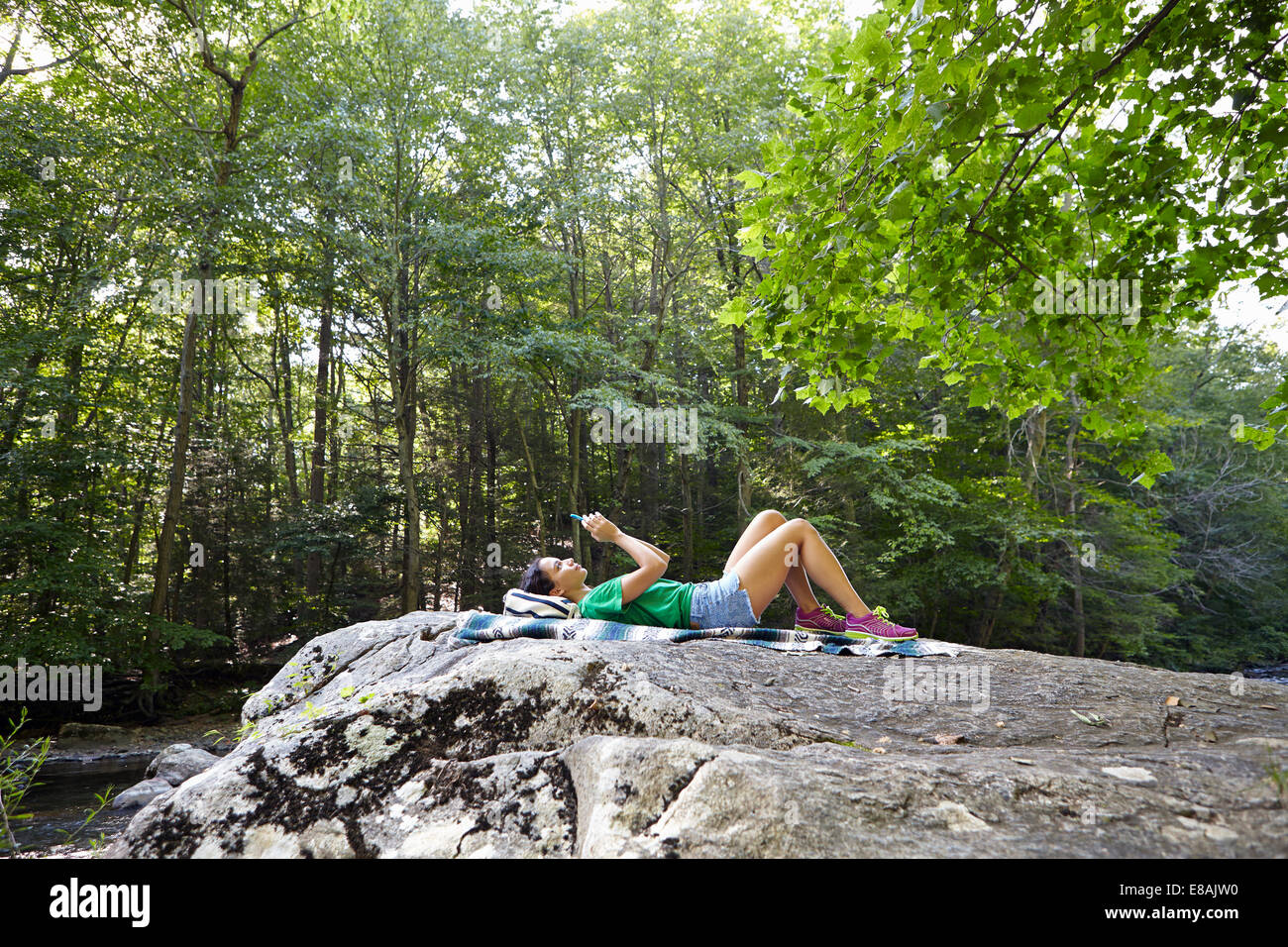Female hiker lying down hi-res stock photography and images - Alamy