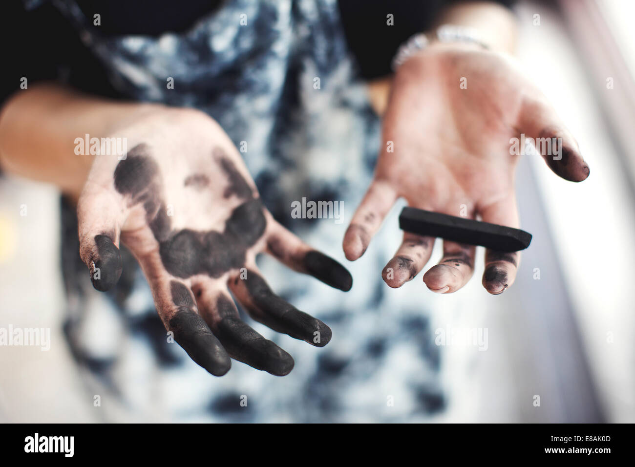Woman's charcoal-stained hands Stock Photo - Alamy