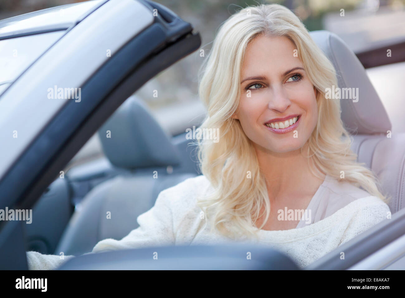 Woman in convertible car hi-res stock photography and images - Alamy