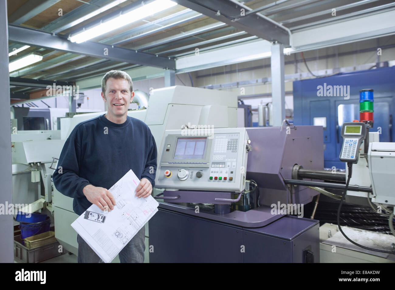 Engineer working in CNC engineering, production and quality control ...