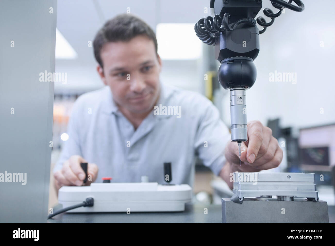 Engineer working in CNC engineering, production and quality control ...