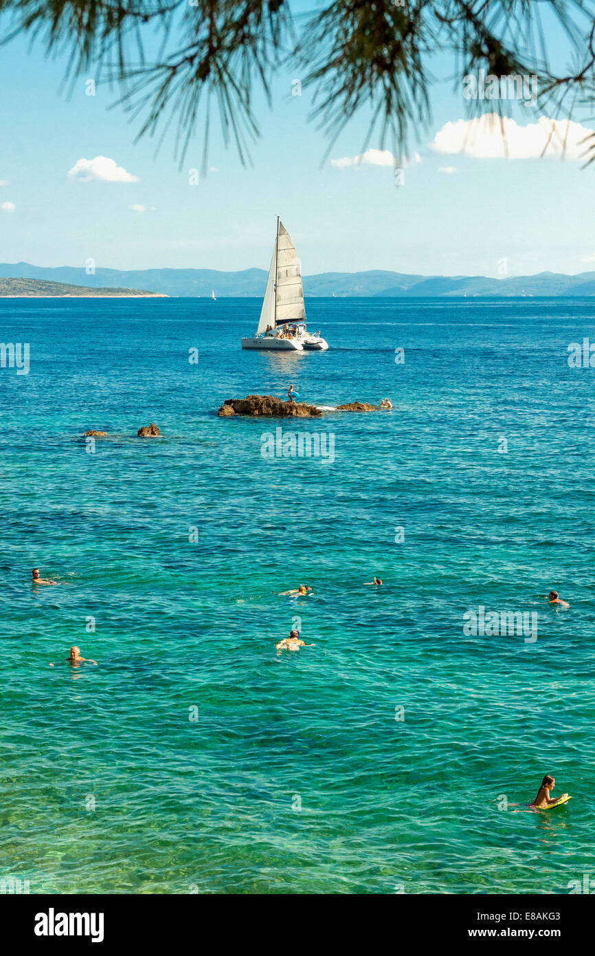 Tourists swimming in Adriatic sea, Jagodna village, Hvar island ...
