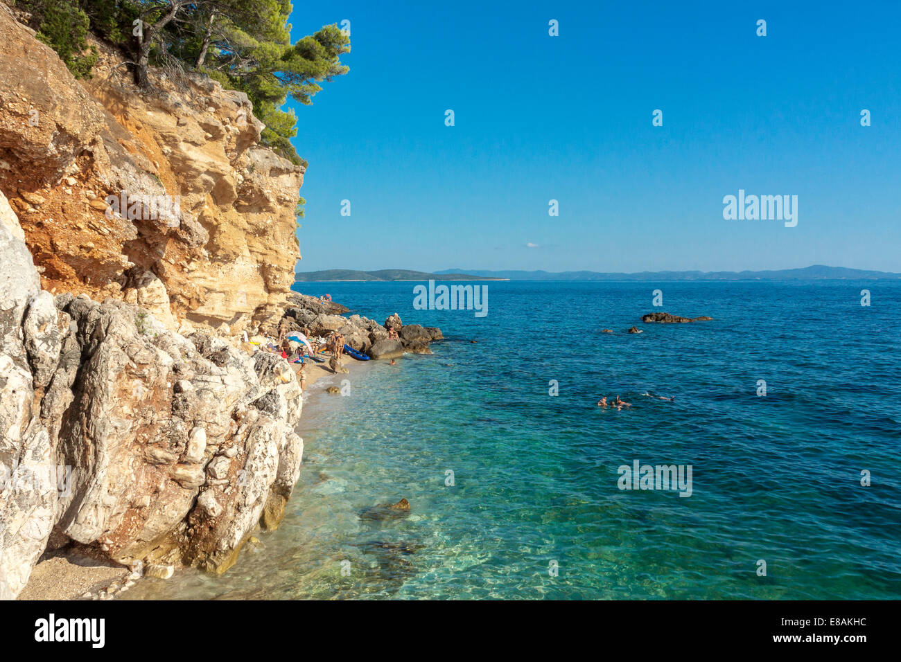 Tourists on a beach in Jagodna village, Hvar island, Croatia Stock ...