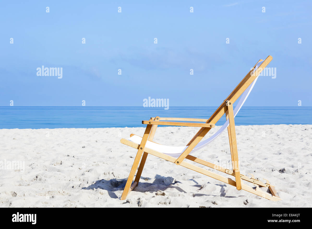 Beach chair stands alone Stock Photo - Alamy