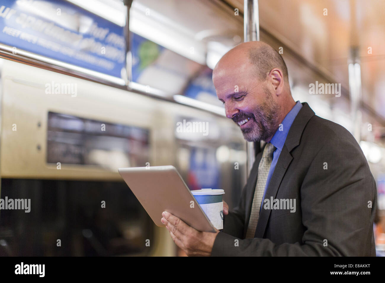 Reading on subway hi-res stock photography and images - Alamy
