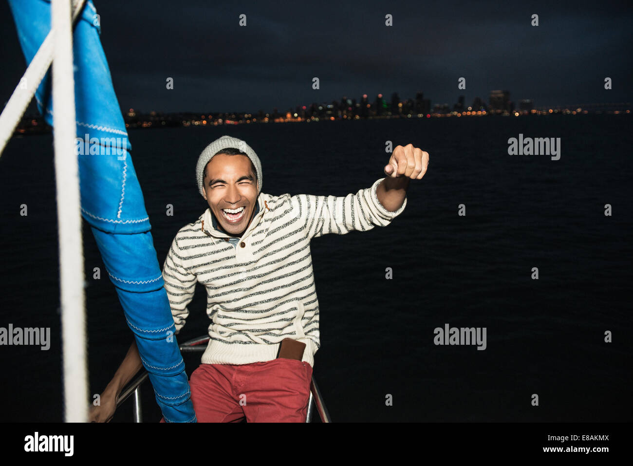 Man on boat smiling laughing hi-res stock photography and images - Alamy