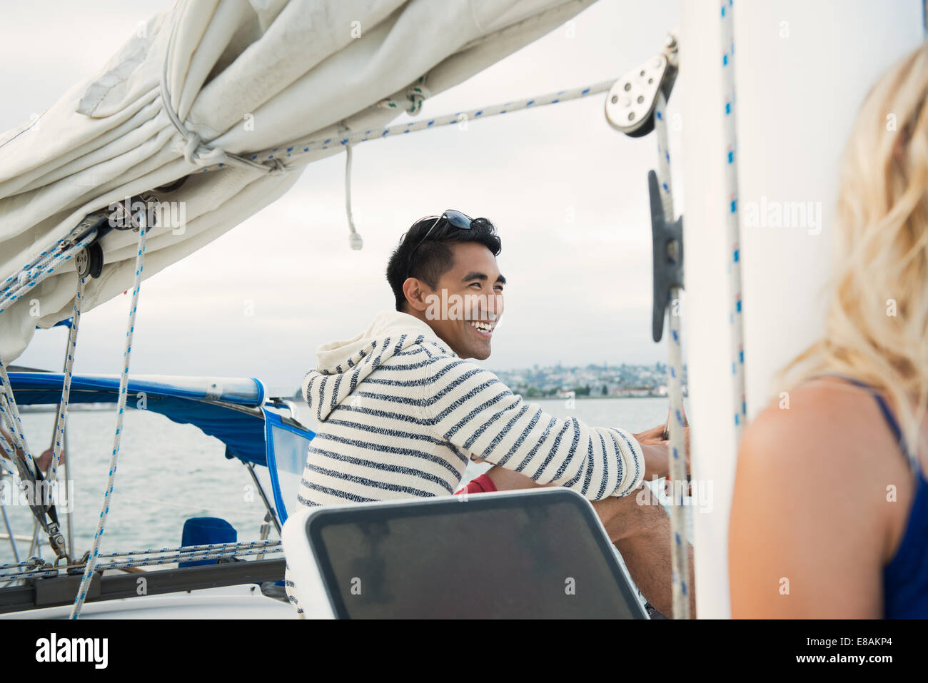 Man on boat smiling laughing hi-res stock photography and images - Alamy
