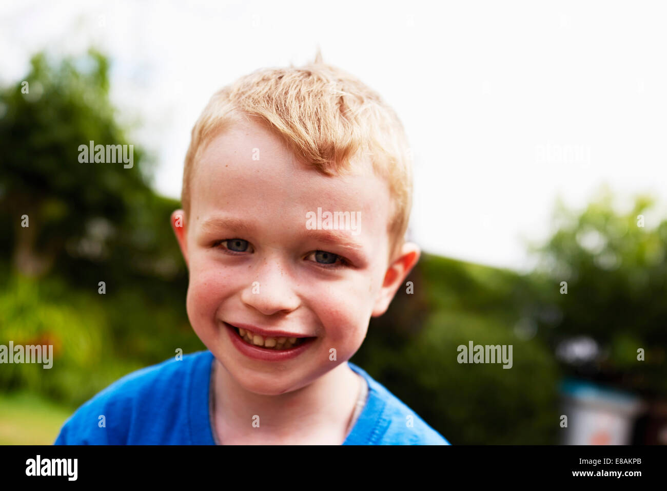 Young boy smiling, portrait Stock Photo - Alamy