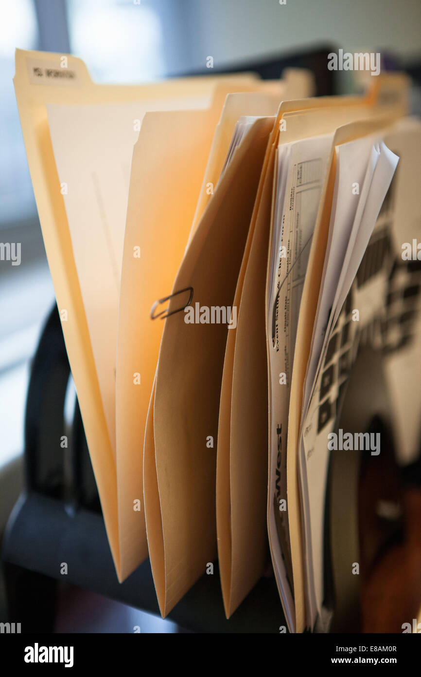Files on desk hi-res stock photography and images - Alamy