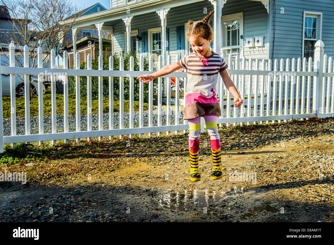 Puddle jumping hi-res stock photography and images - Alamy