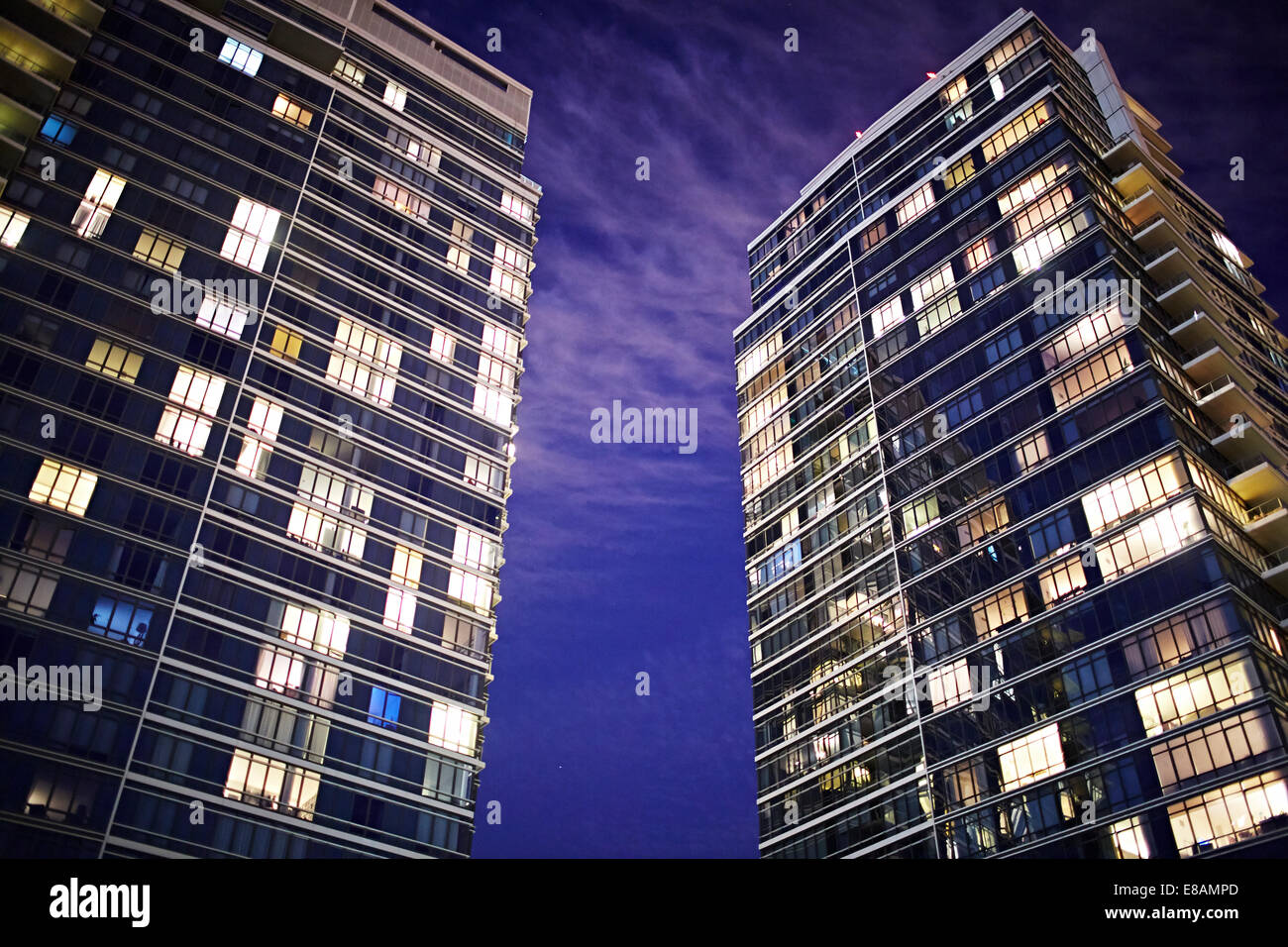 High rise buildings at night Stock Photo - Alamy