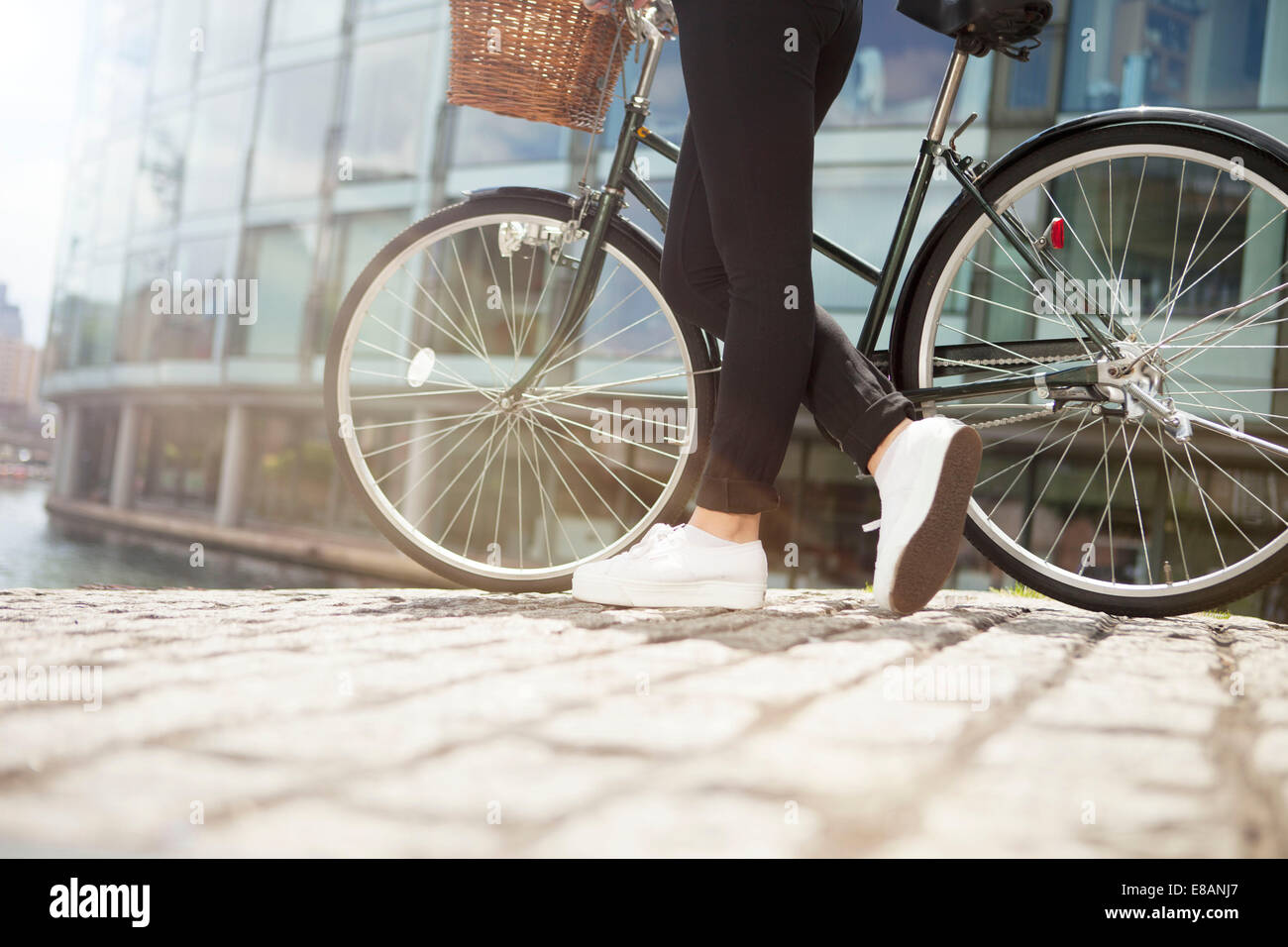 Woman pushing bike along canal hi-res stock photography and images - Alamy