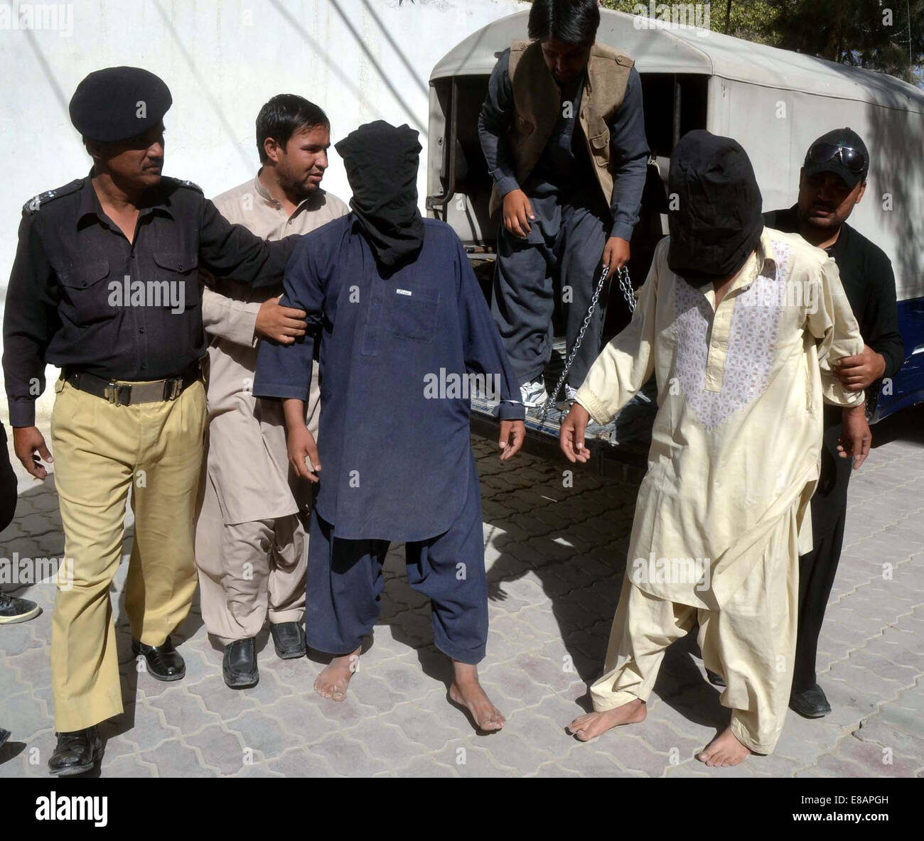 Police escorting criminals alleged in kidnapping of children for ransom ...