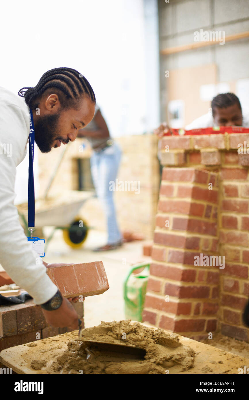 Bricklaying Woman High Resolution Stock Photography and Images - Alamy