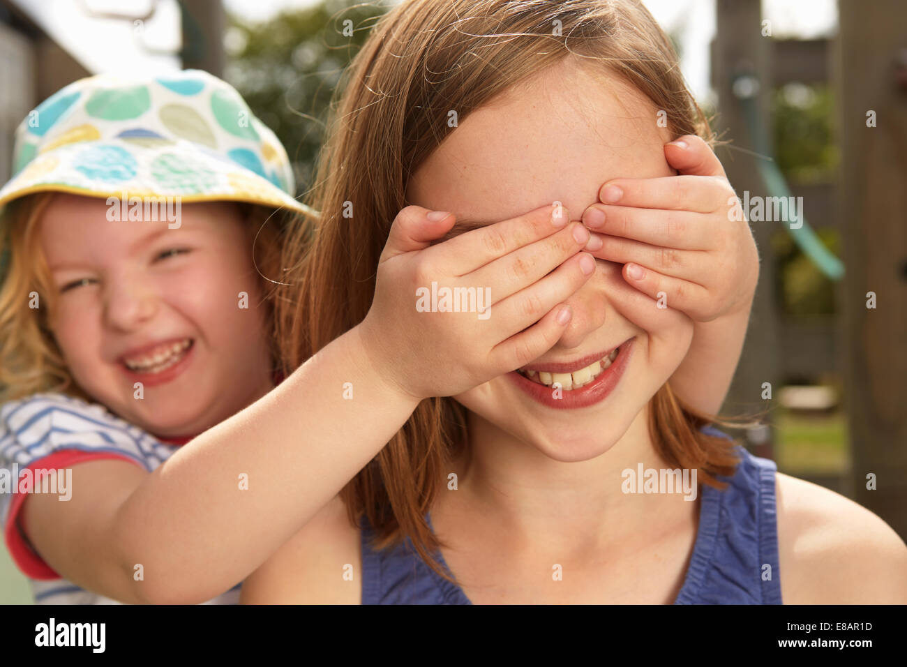 Child hands over her eyes hi-res stock photography and images - Alamy