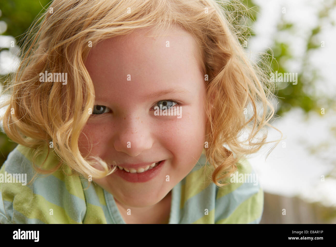 Low angle close up portrait of cute girl Stock Photo - Alamy