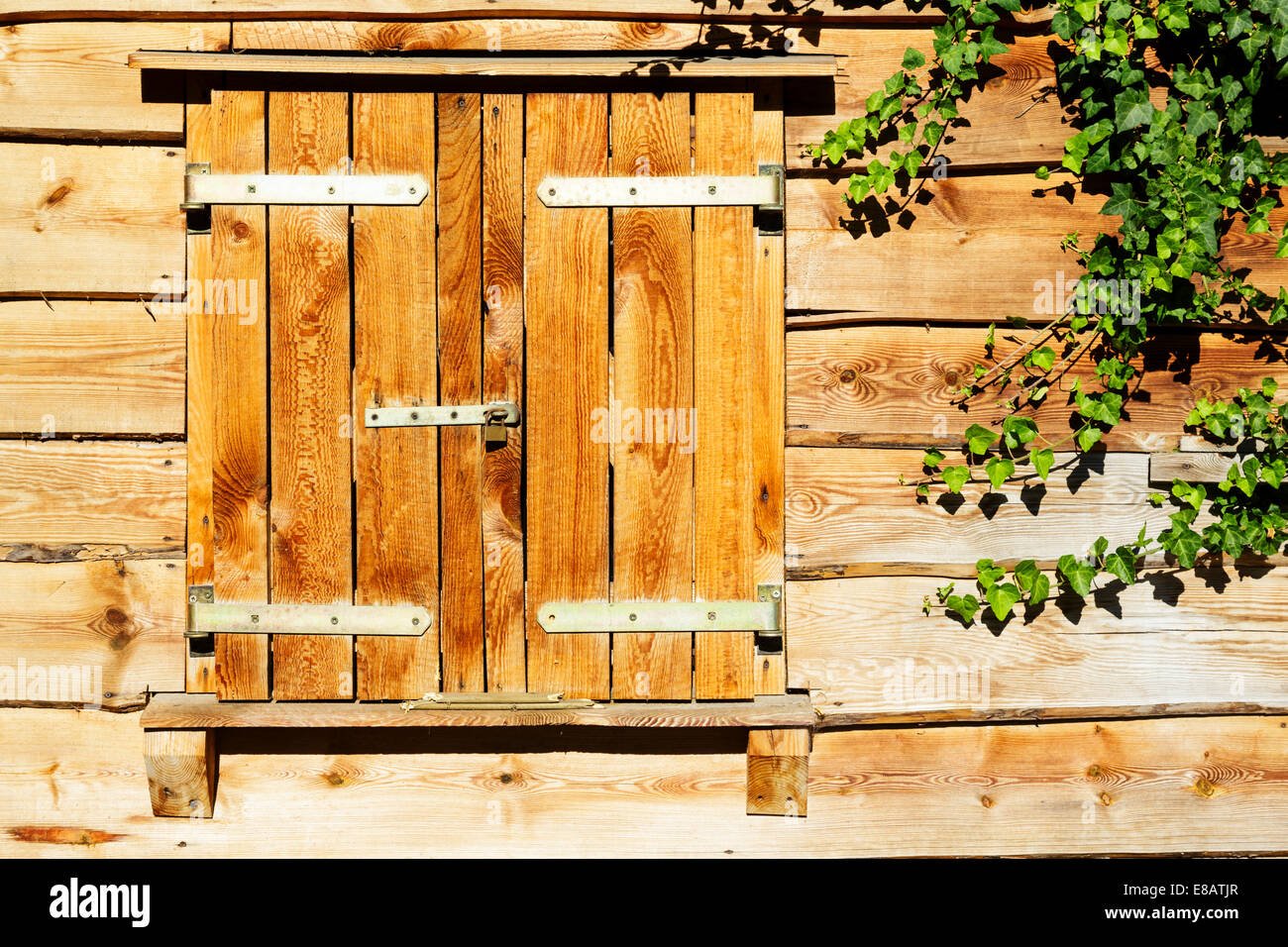 Window closed with the shutters Stock Photo - Alamy