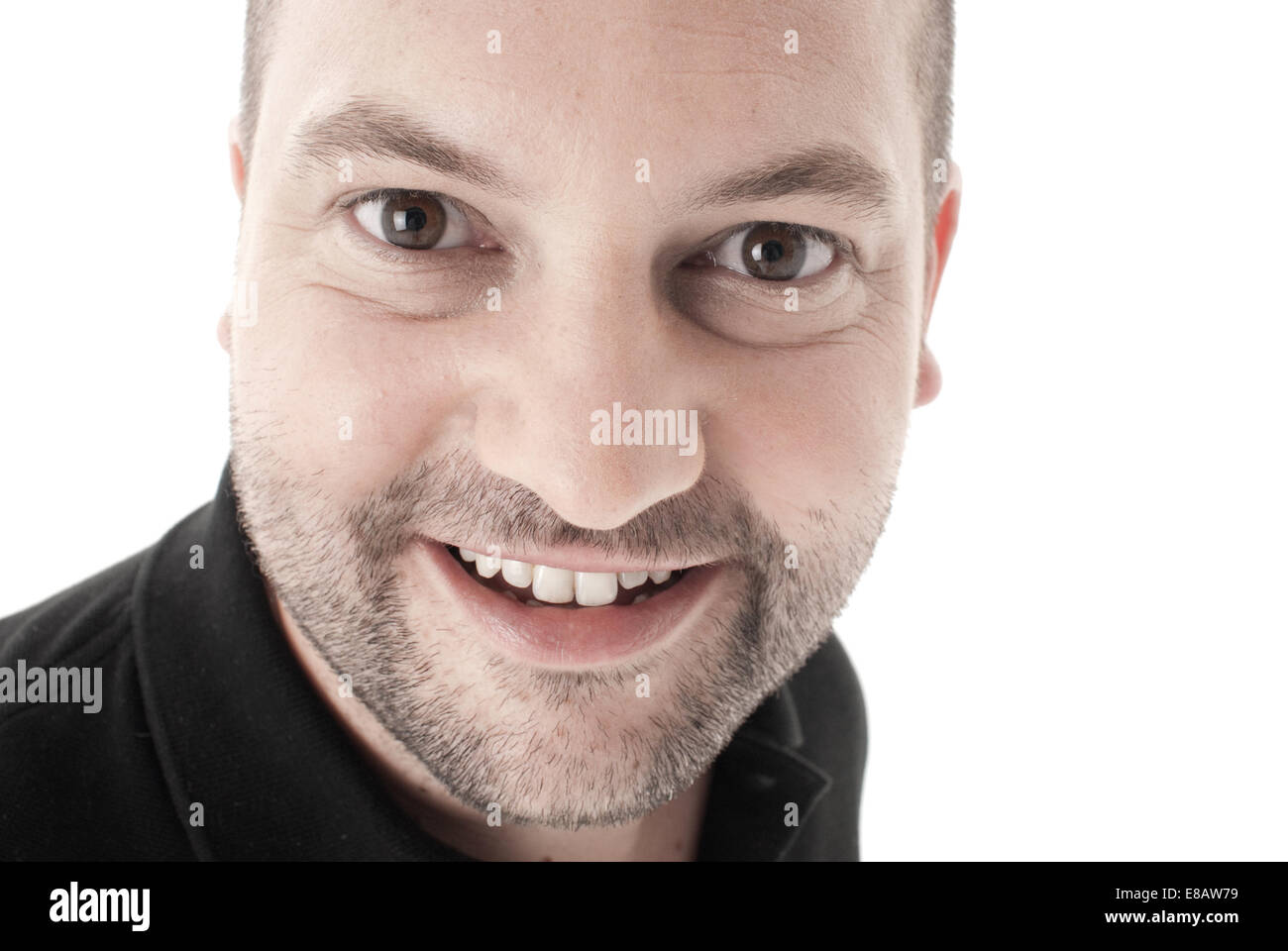 Close up photo of an aderage man smiling and looking directly into the ...
