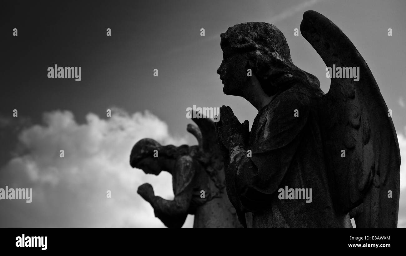Angel statue silhouette Black and White Stock Photos & Images - Alamy