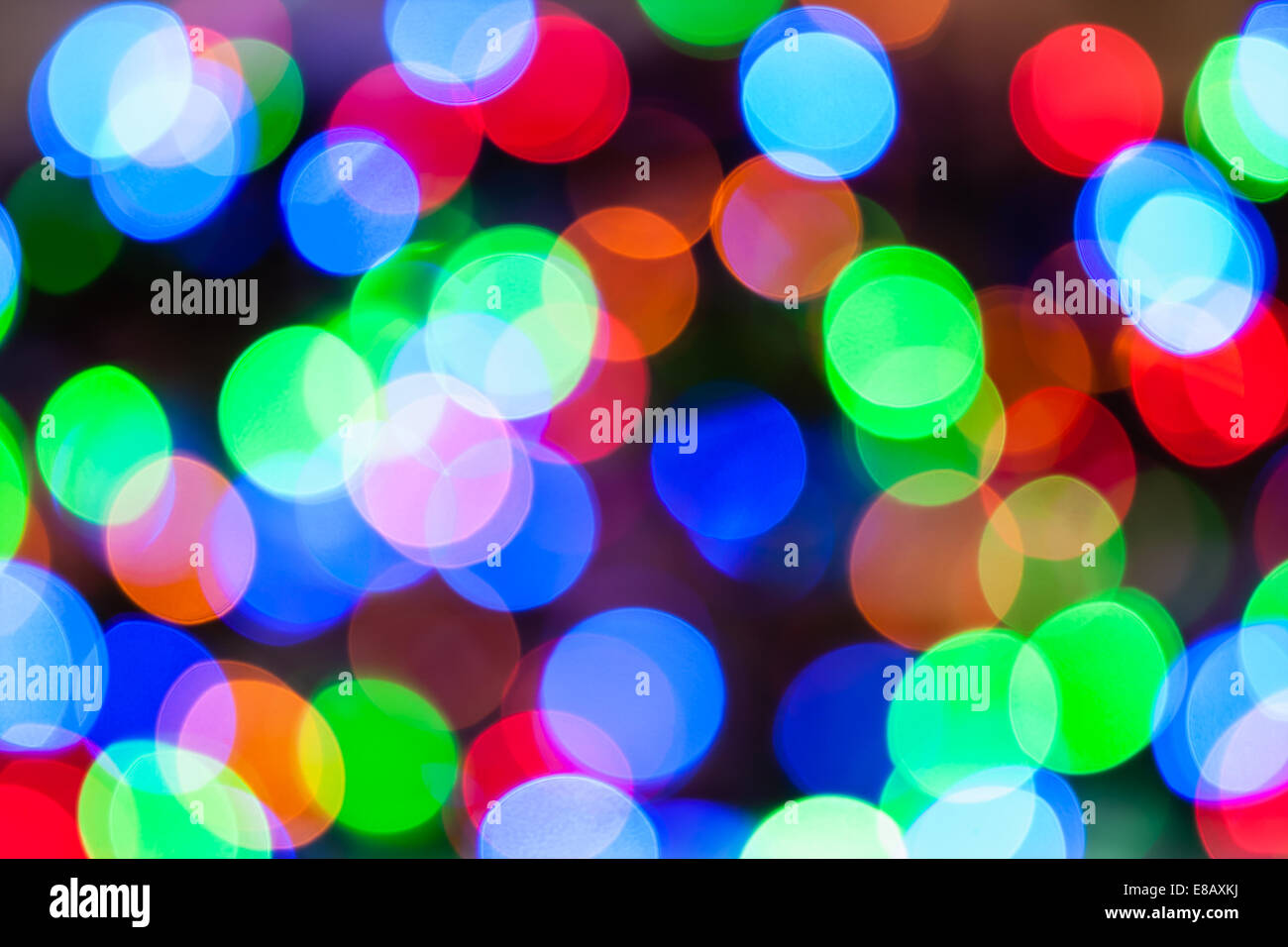 A bright multicolor bokeh background created by a set of defocused ...
