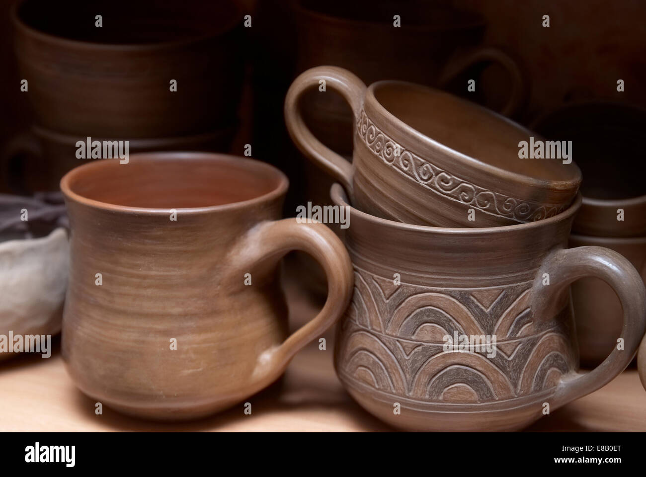 Many handmade old clay pots on the shelf Stock Photo - Alamy