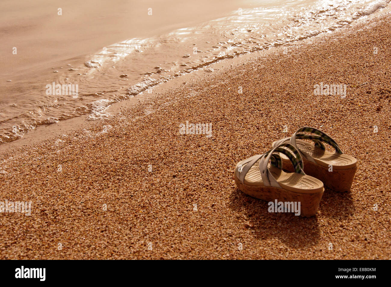 Shoes on beach hi-res stock photography and images - Alamy