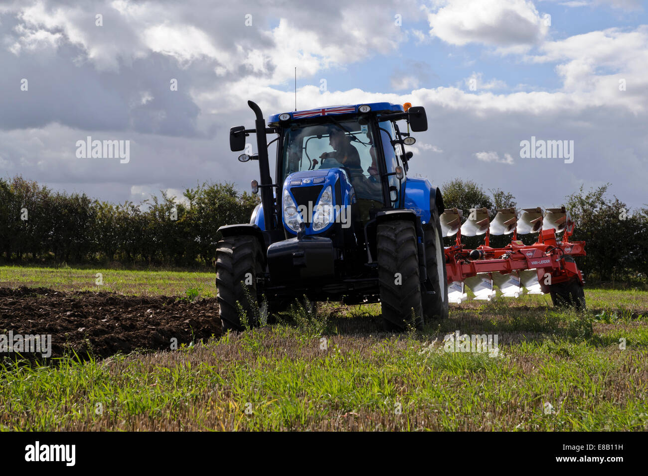 big "new holland" tractor ploughing plowing with wheeled seven furrow ...