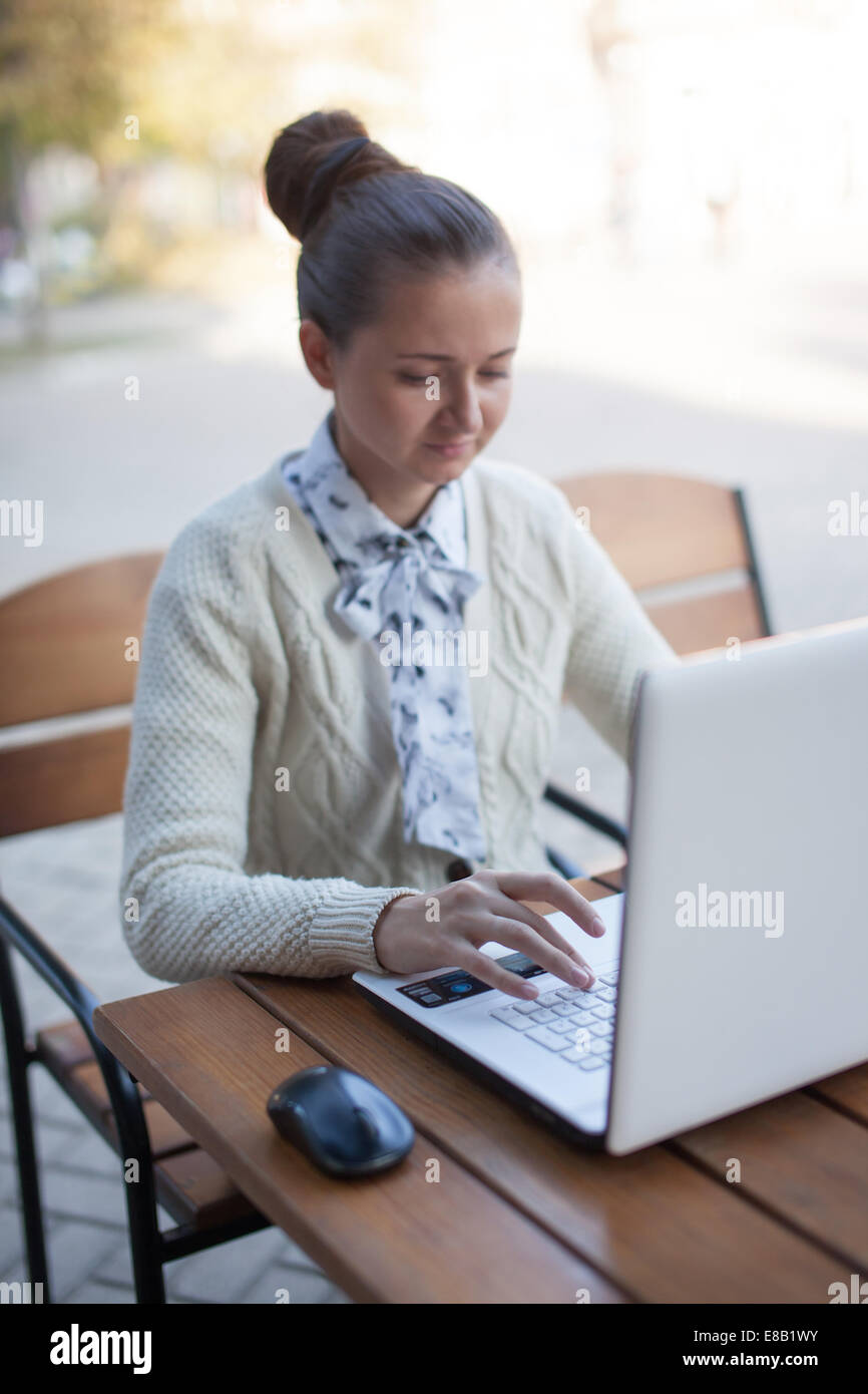 woman typing during work outdoor Stock Photo - Alamy